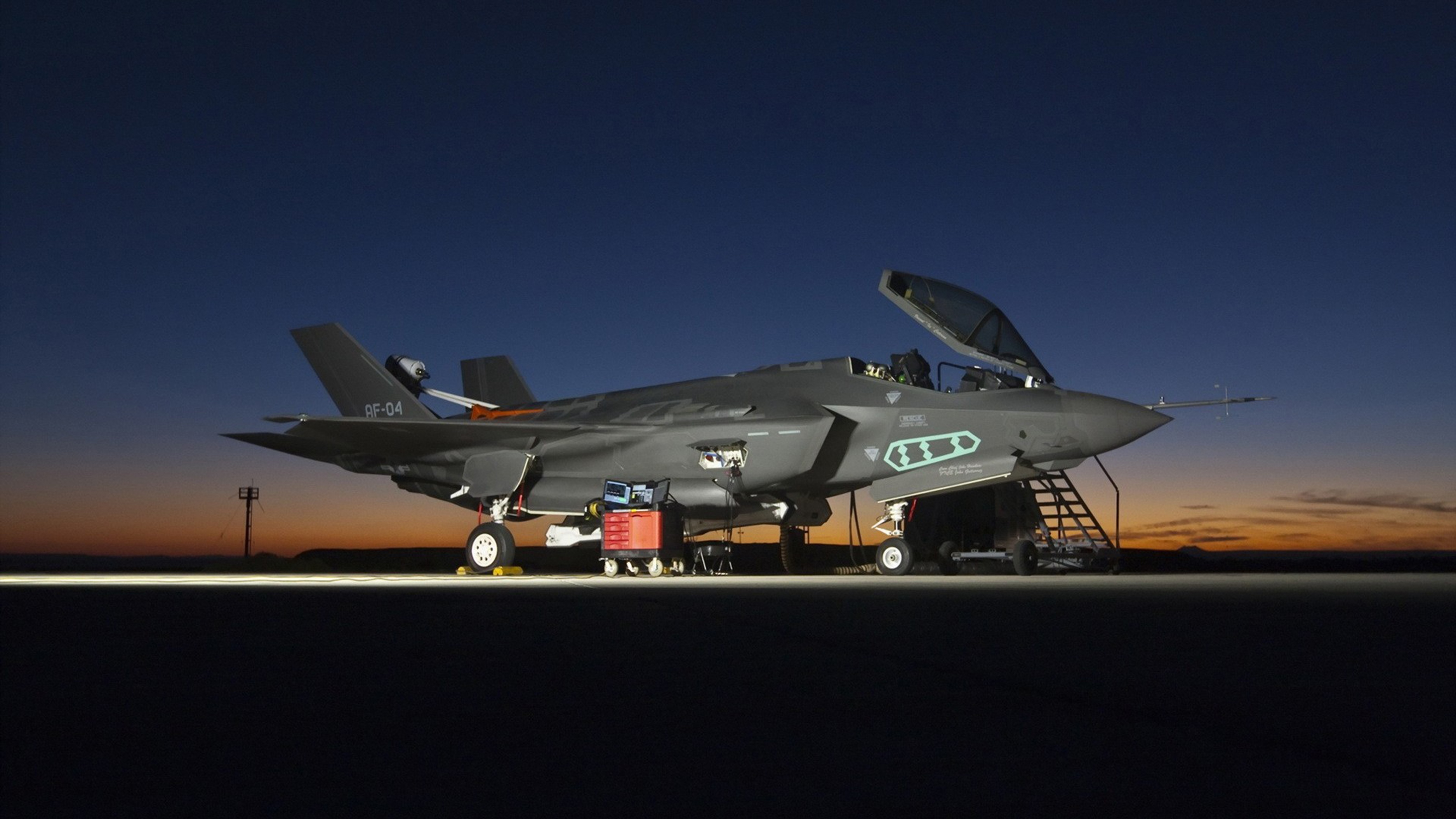 F-35 Joint Strike Fighter aircraft on runway at night | NAWCAD Lakehurst