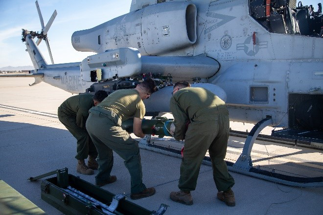 USMC VMX-1 load JAGM onto a AH-1Z Viper | NAVAIR